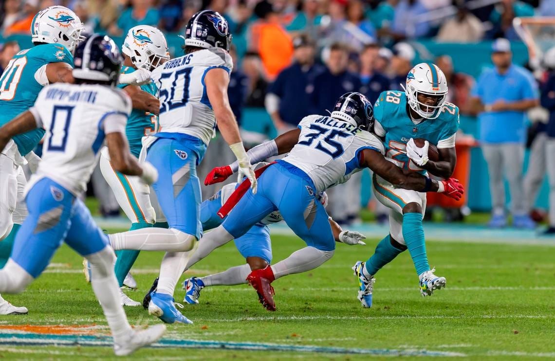 Quick Slant: Dolphins and Titans Prepare to Get Busy Livin' or Get Busy ...